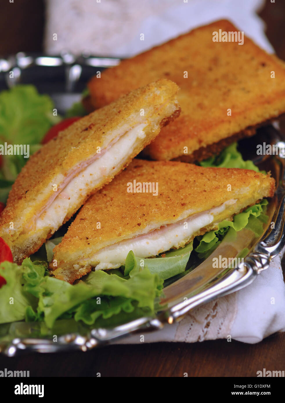 Italian fried sandwich with ham and cheese Stock Photo - Alamy