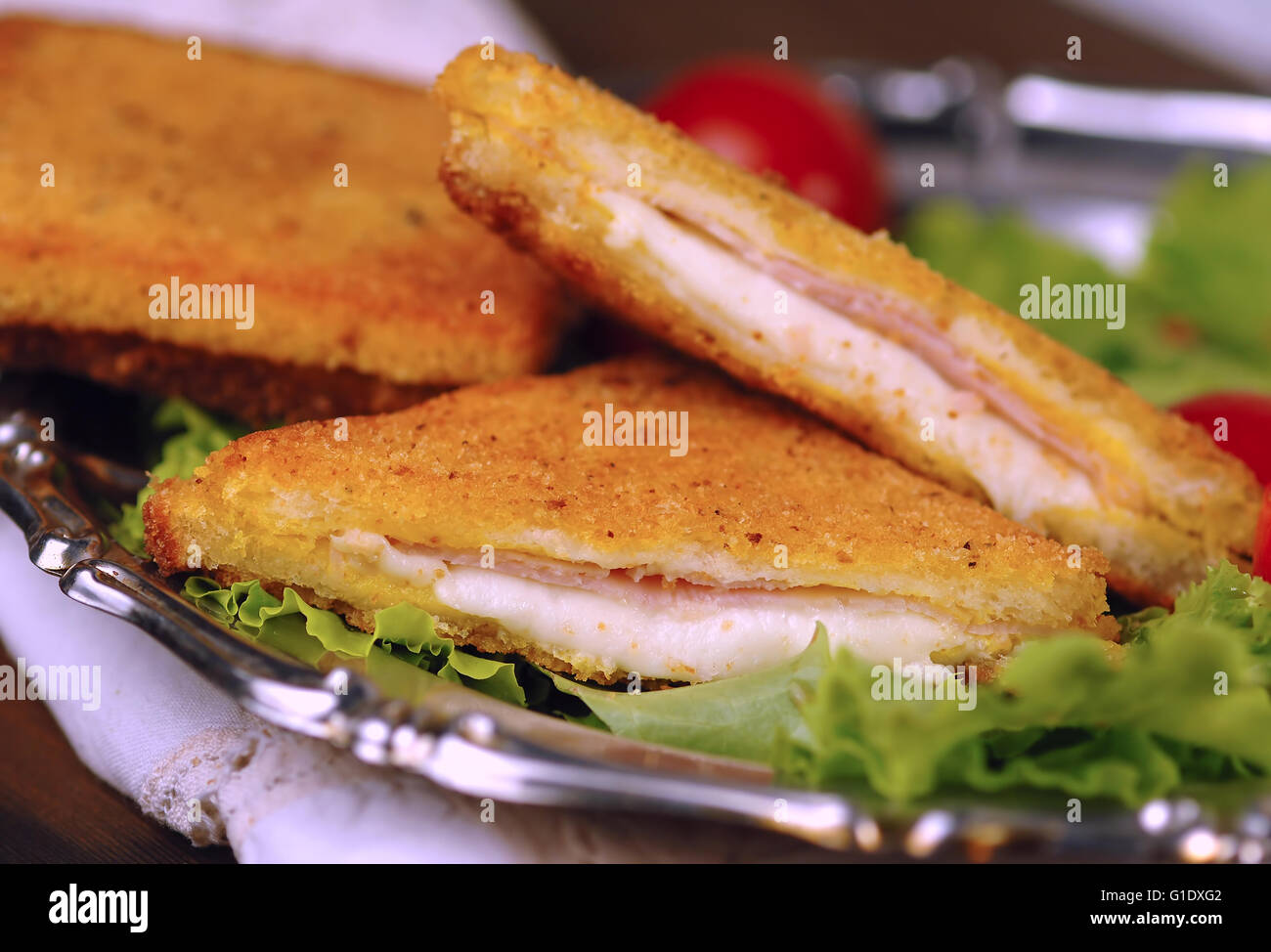 Italian fried sandwich with ham and cheese Stock Photo - Alamy