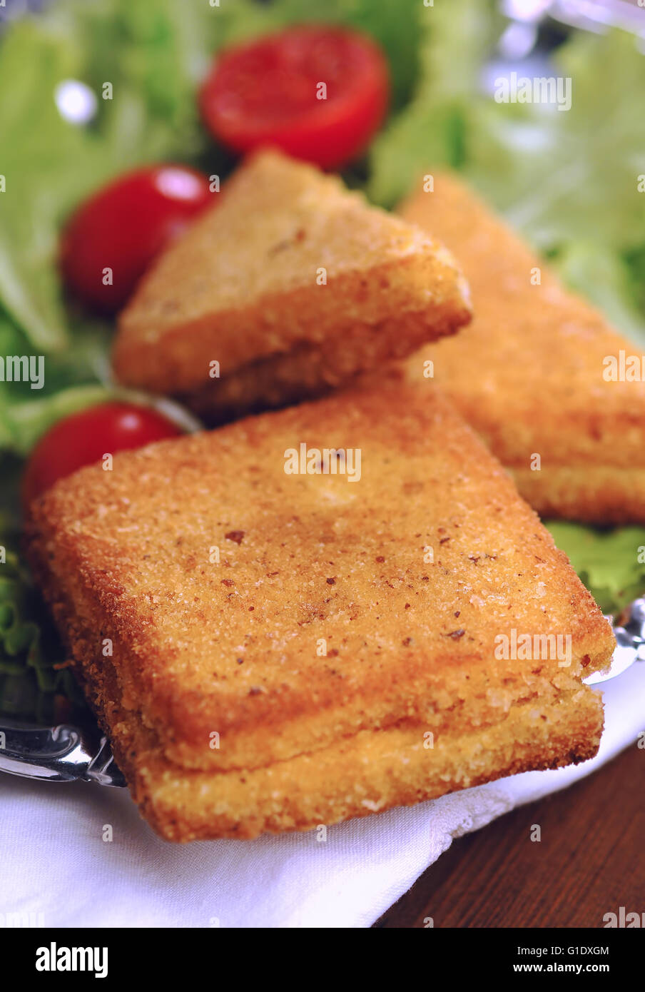Italian fried sandwich with ham and cheese Stock Photo - Alamy