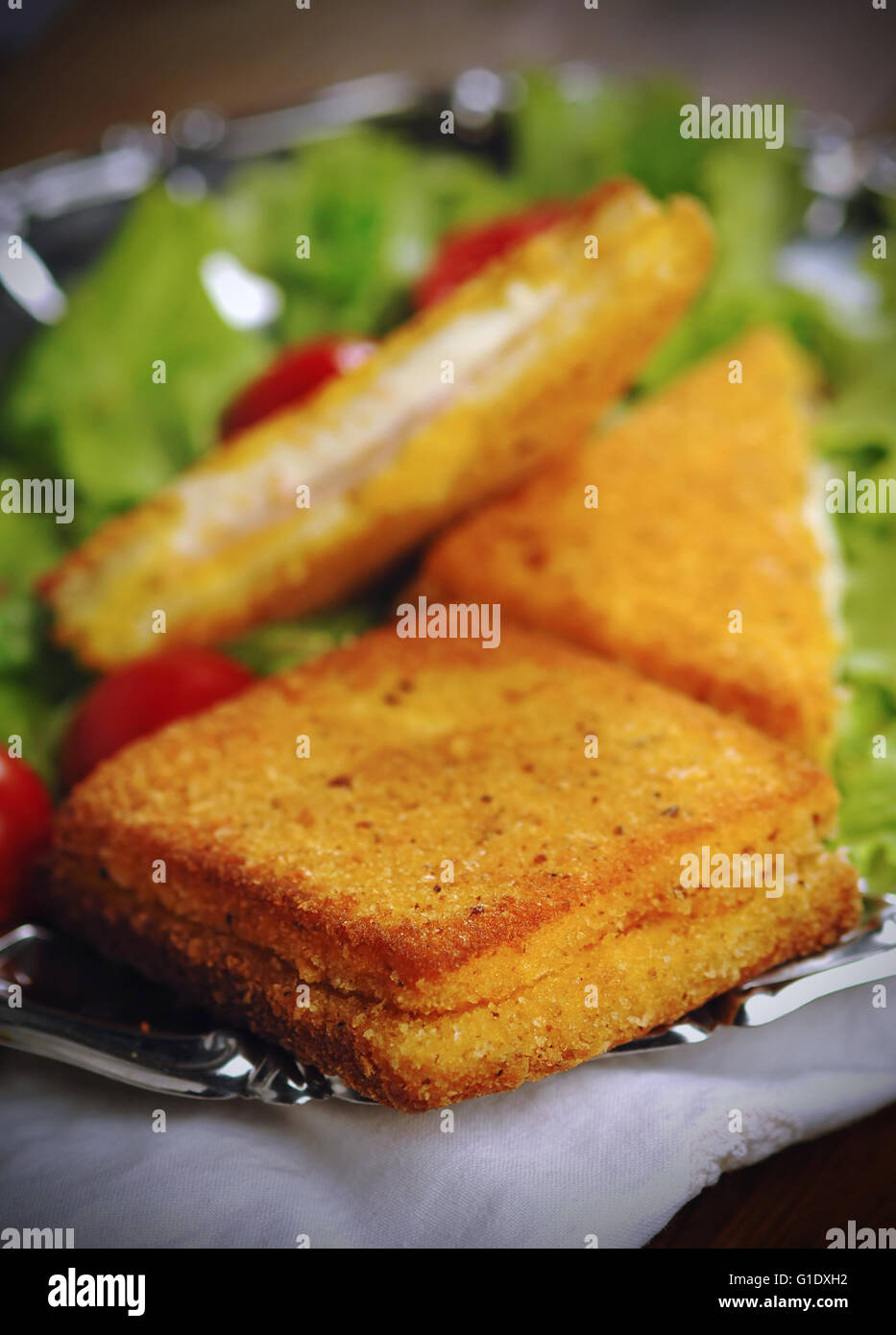 Italian fried sandwich with ham and cheese Stock Photo - Alamy