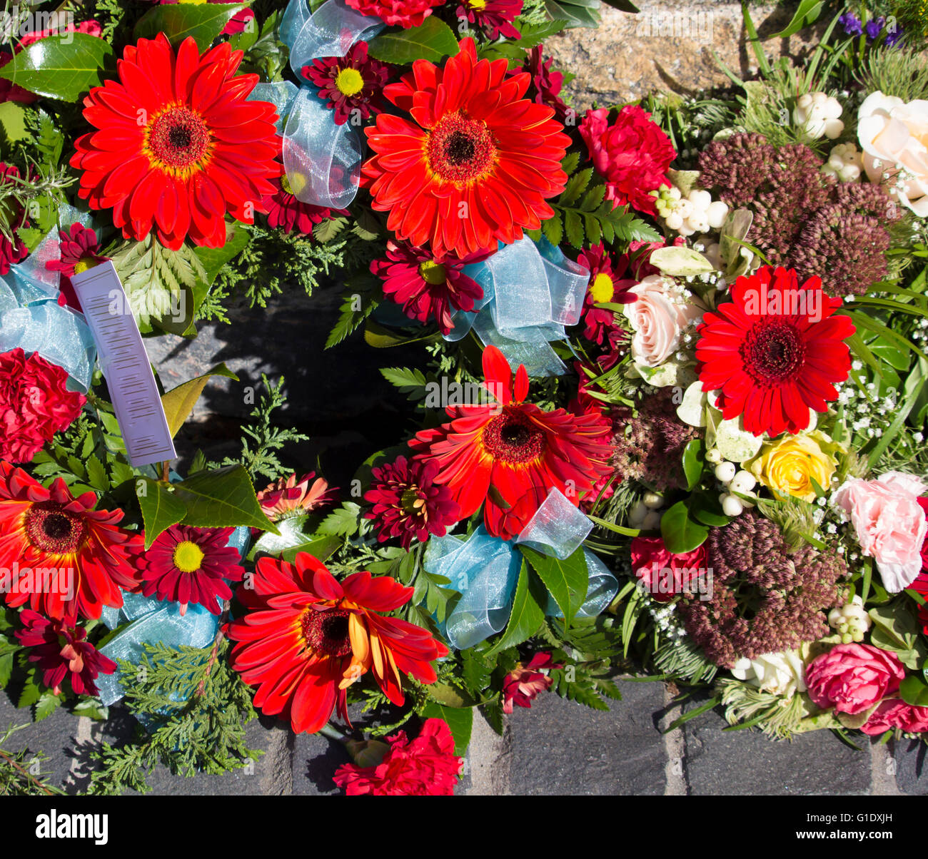 Colourful fresh floral wreaths for Anzac Day memorial celebrations on ...