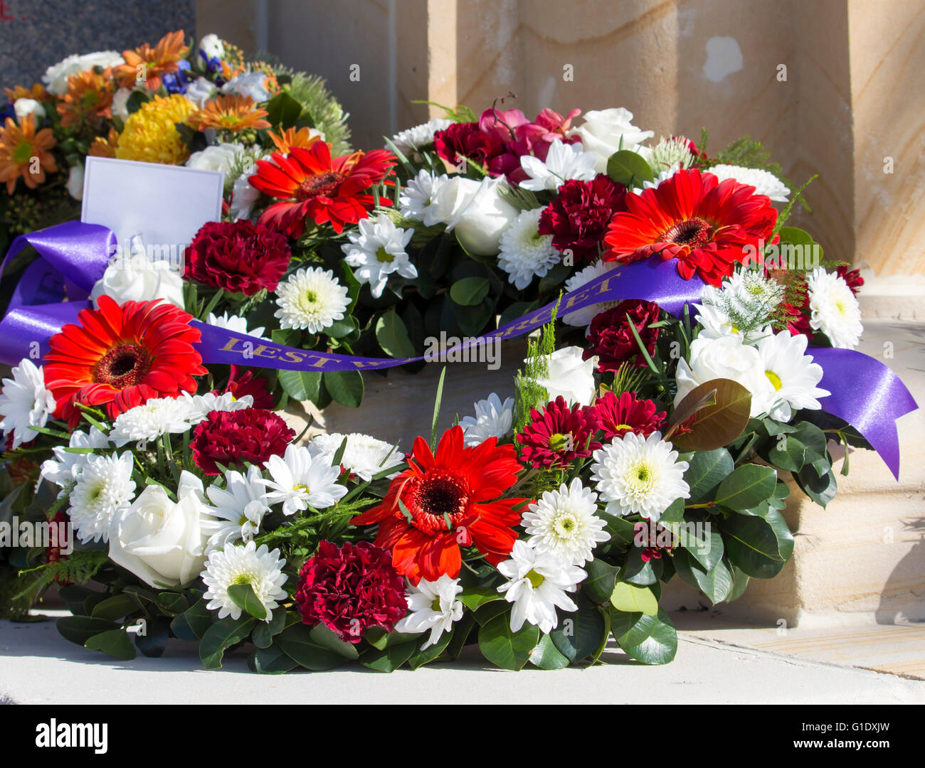 Colourful fresh floral wreaths for Anzac Day memorial celebrations on ...