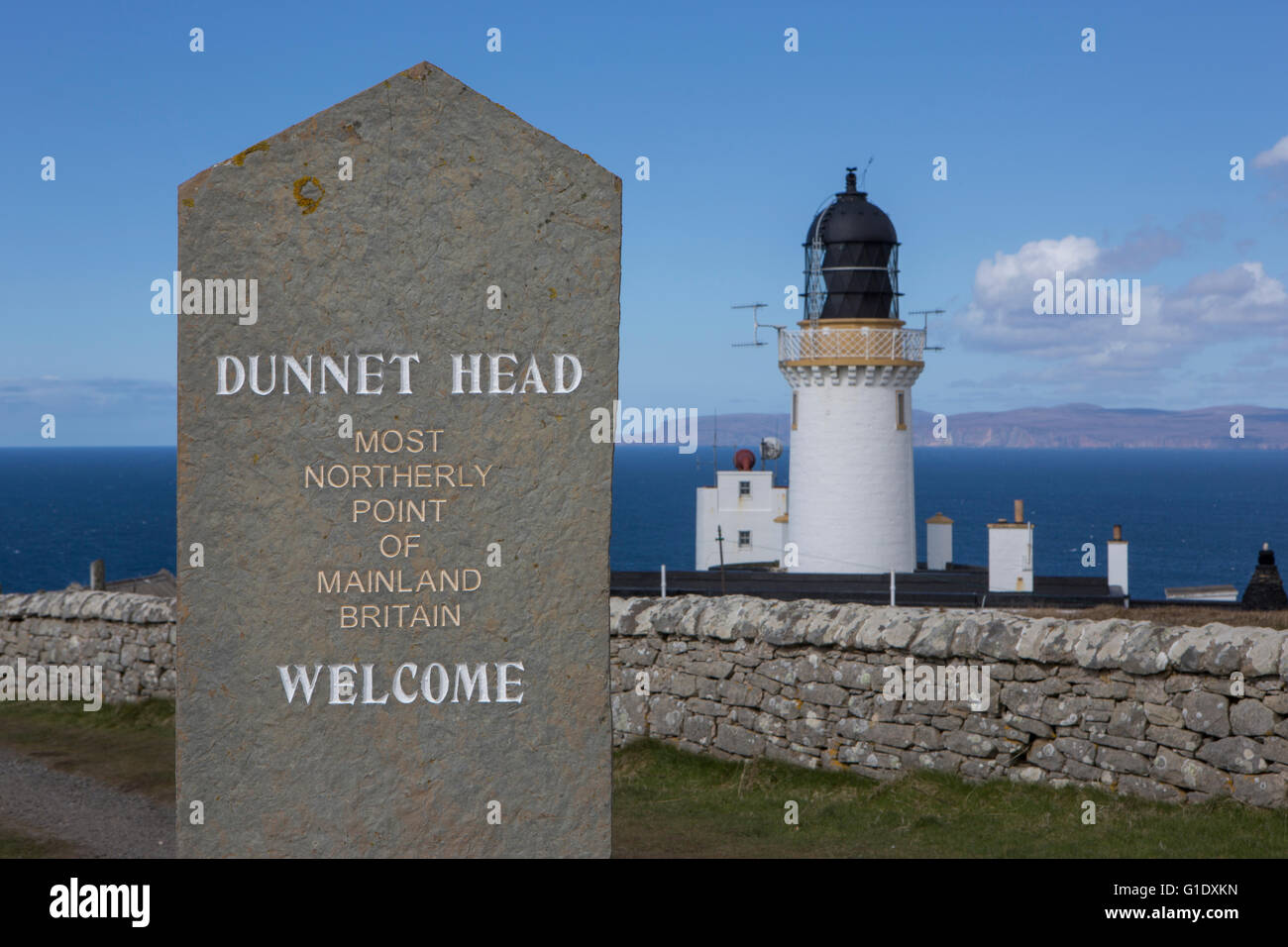 Dunnet head sign and lighthouse Stock Photo - Alamy