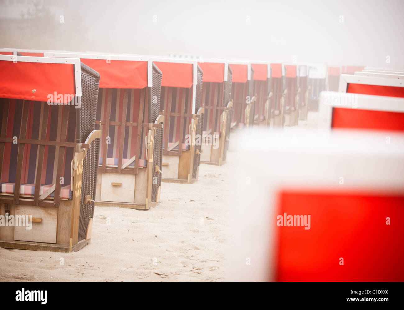 Strandkorb, Beach chairs on the sandy beach of Binz seaside resort on ...