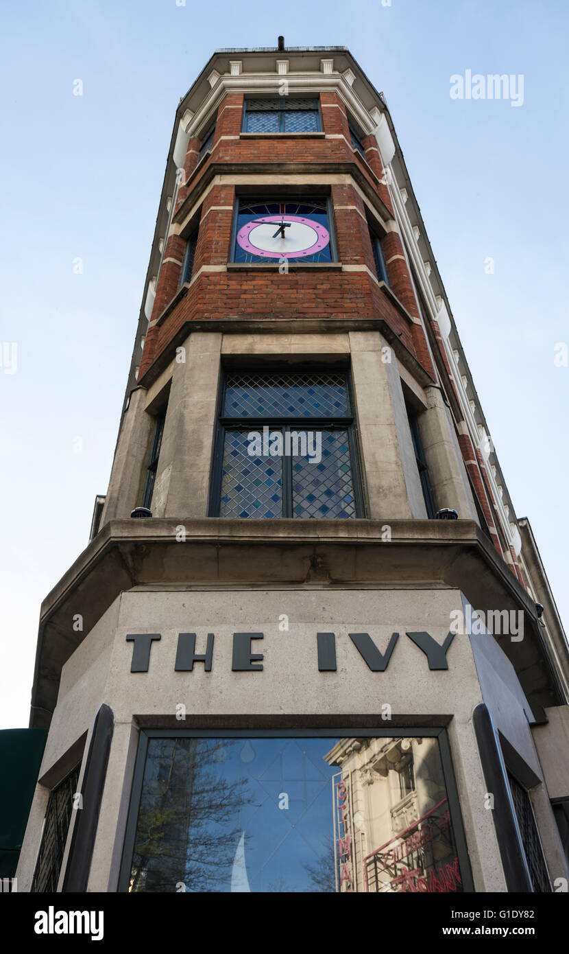 Reflections in the window at the world famous Ivy Restaurant in London ...
