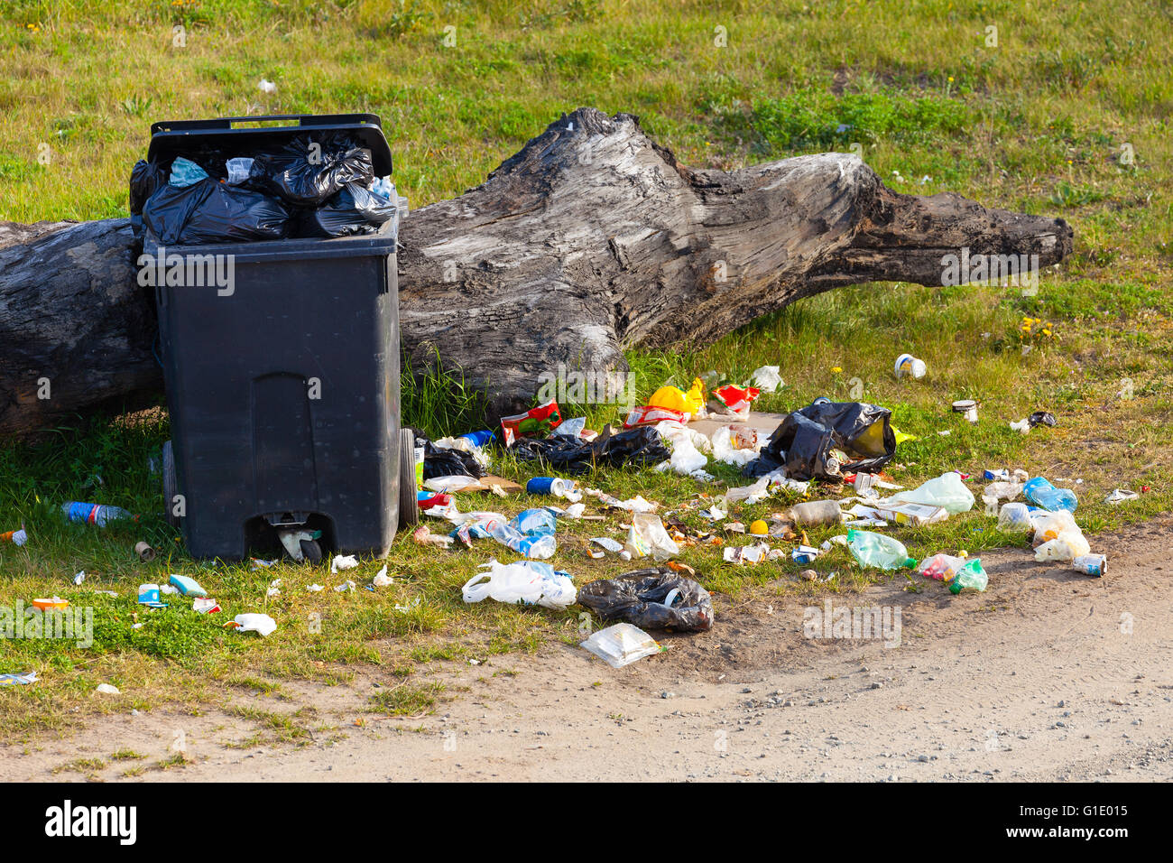 Garbage waste in park full of all sort of trash Stock Photo - Alamy