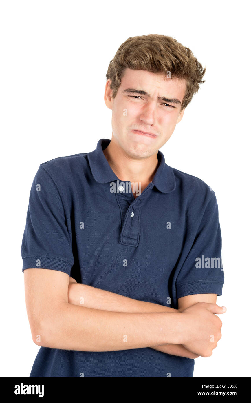 Disgusted teenage boy making faces isolated in white Stock Photo - Alamy