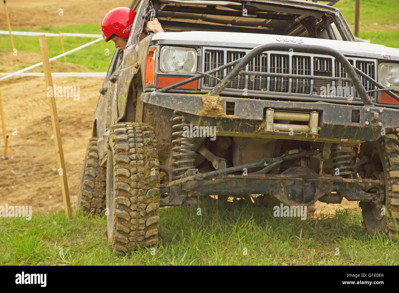 Unidentified racer at Jeep car on a steep slope Stock Photo - Alamy