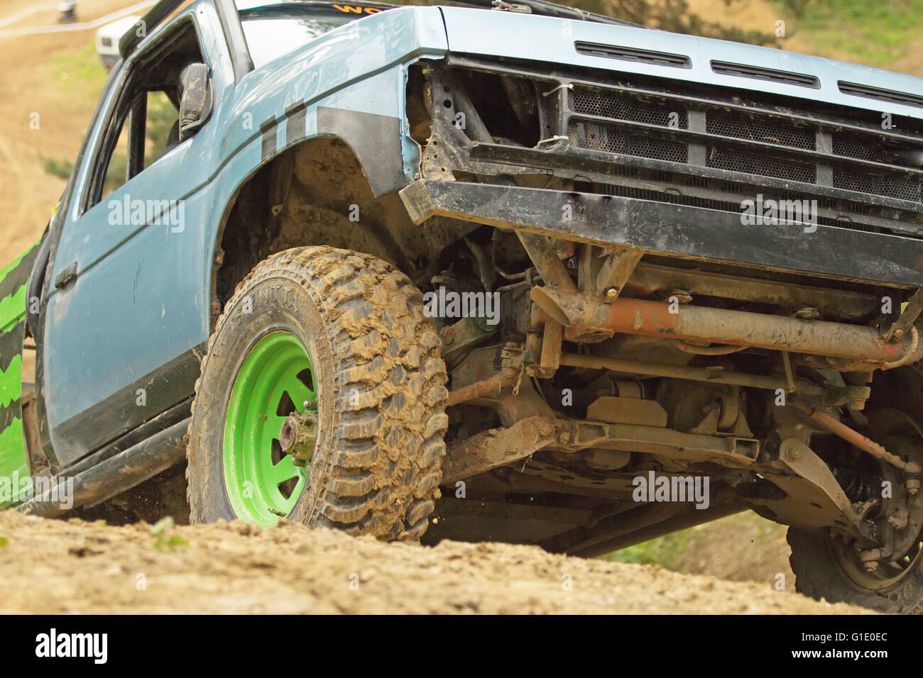 Off-road vehicle leaves a challenging slope. Vertically Stock Photo - Alamy