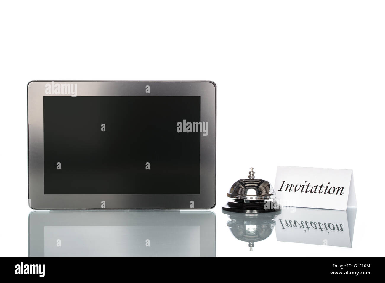 tablet and Service bell on white background, invitation Stock Photo - Alamy