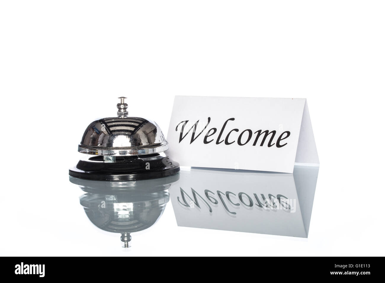 Service bell on the Check in desk with white background Stock Photo - Alamy