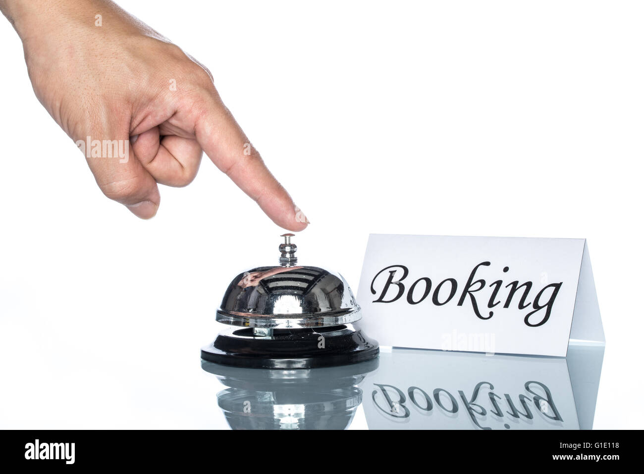 Service bell on the Check in desk with white background Stock Photo - Alamy