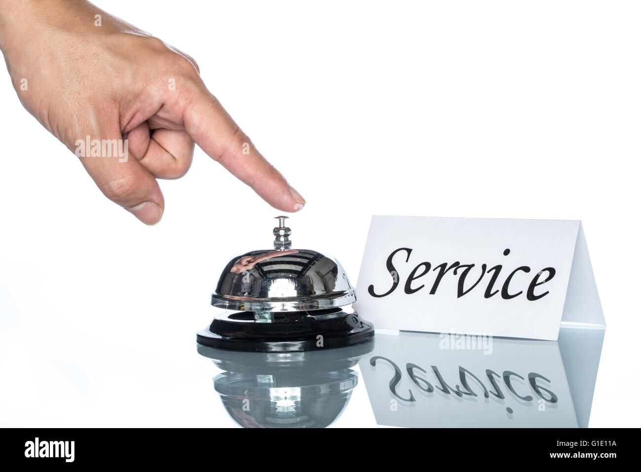 Service bell on the Check in desk with white background Stock Photo - Alamy
