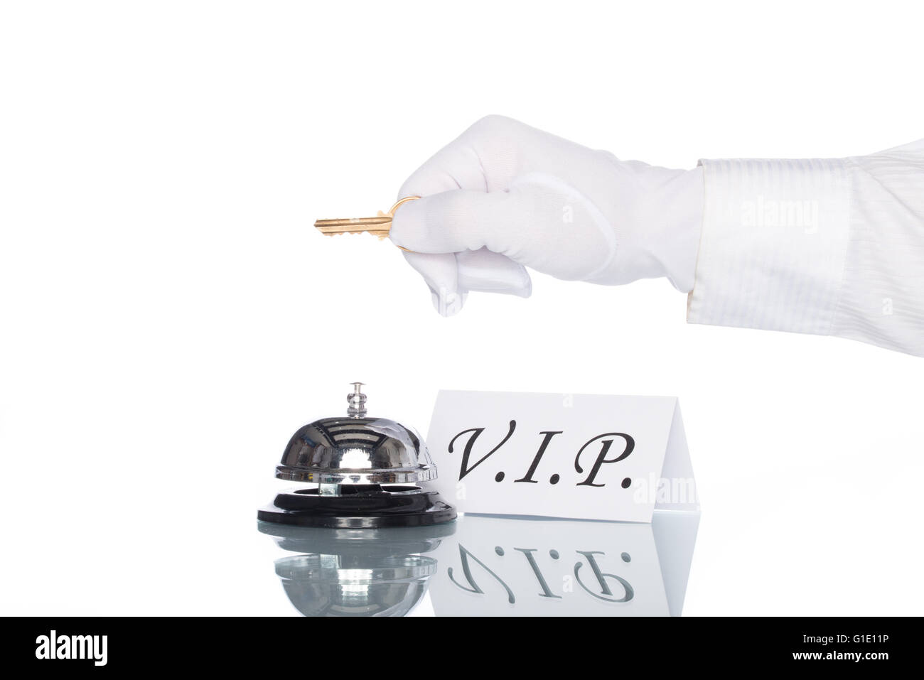Service bell on the Check in desk with white background Stock Photo - Alamy