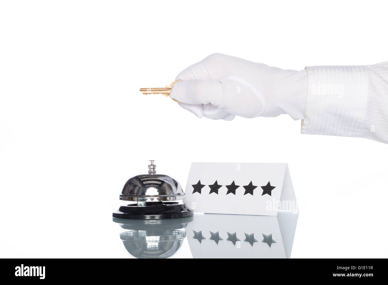 Service bell on the Check in desk with white background Stock Photo - Alamy