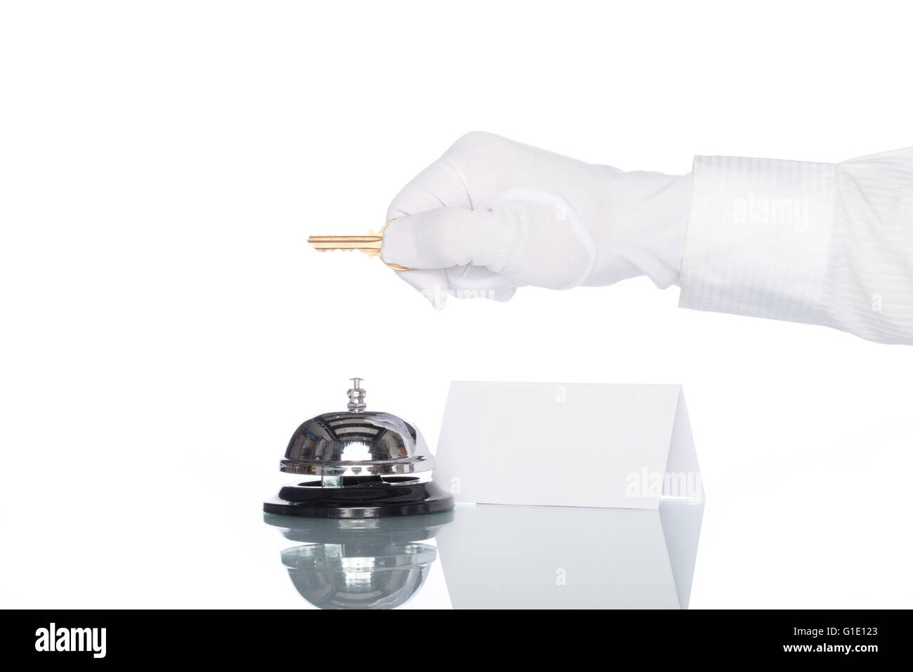 Service bell on the Check in desk with white background Stock Photo - Alamy