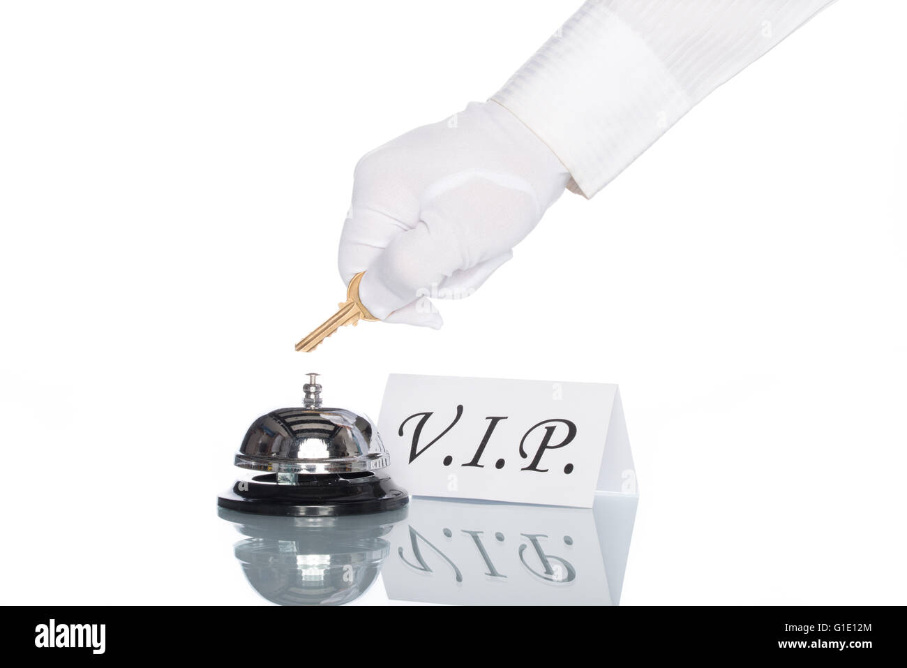 Service bell on the Check in desk with white background Stock Photo - Alamy
