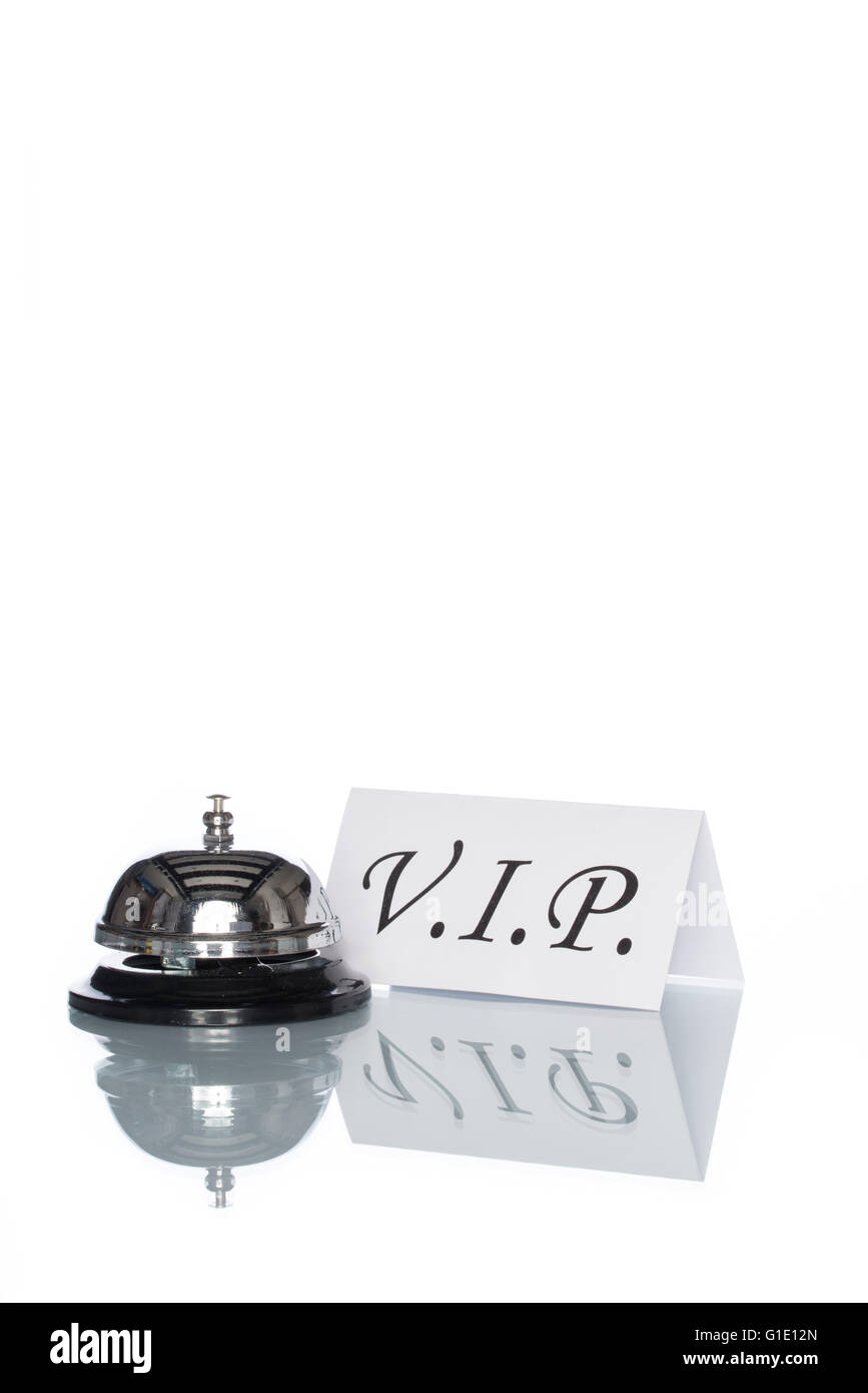 Service bell on the Check in desk with white background Stock Photo - Alamy