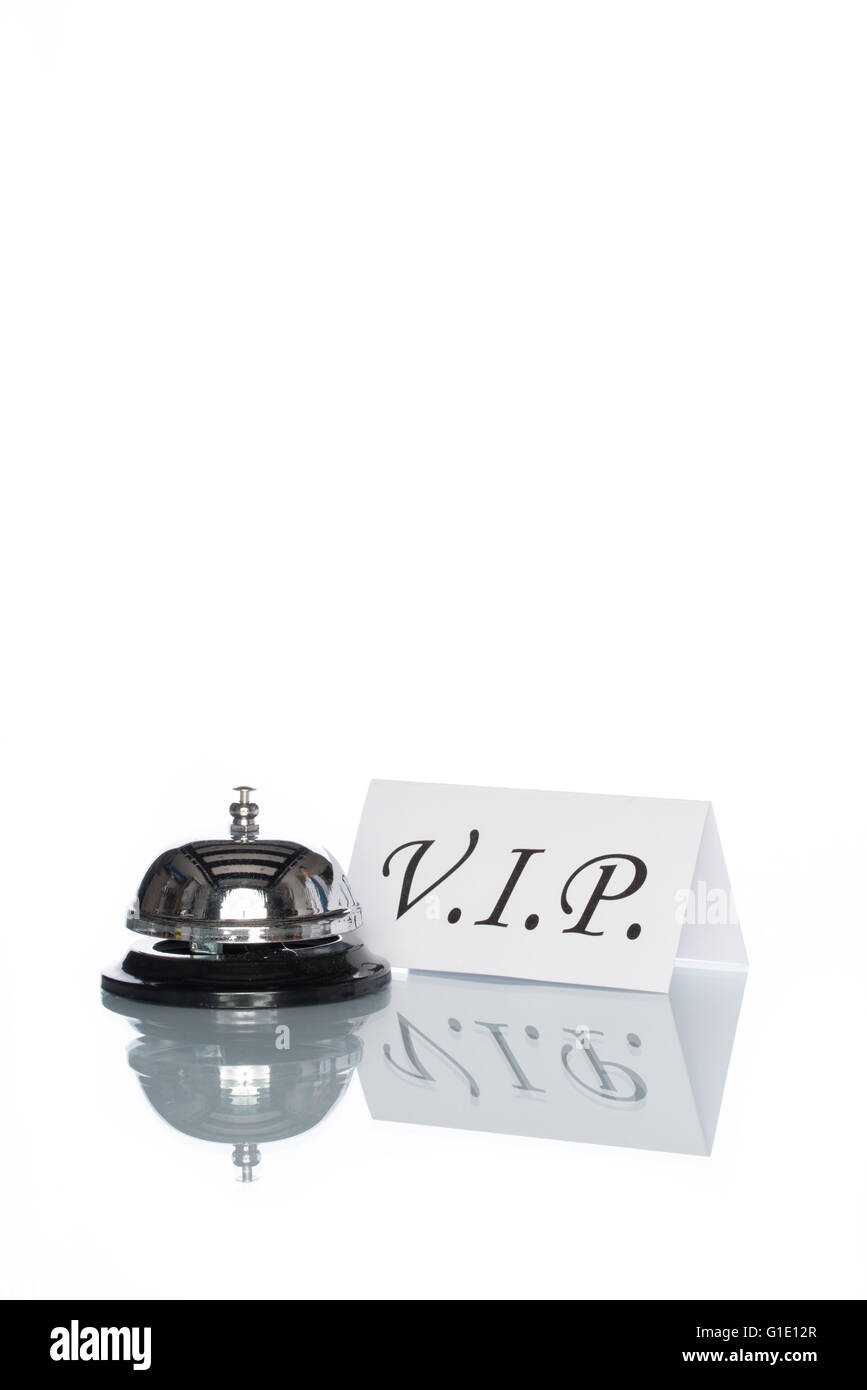 Service bell on the Check in desk with white background Stock Photo - Alamy