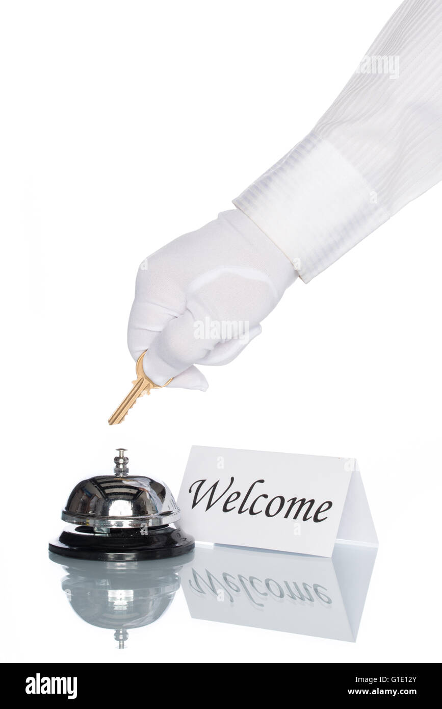 Service bell on the Check in desk with white background Stock Photo - Alamy