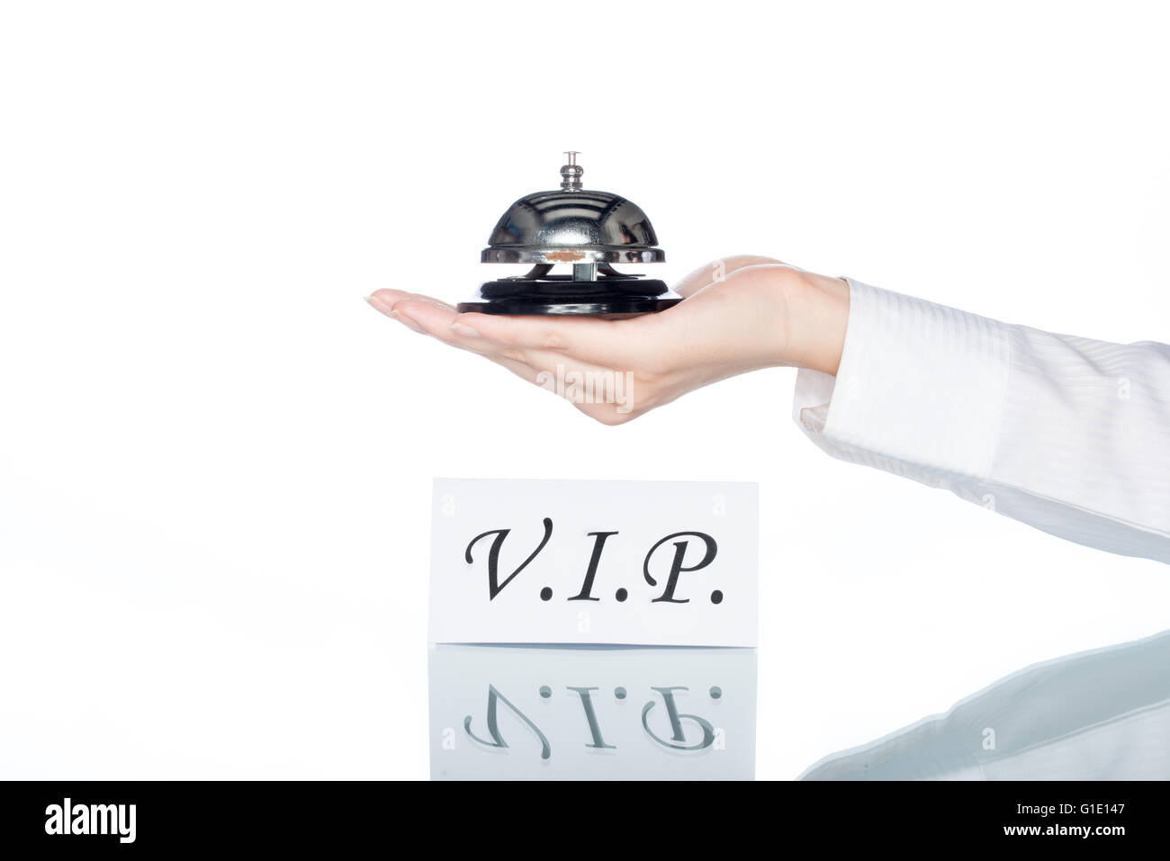 woman hand holding Service bell with vip card on white background Stock ...