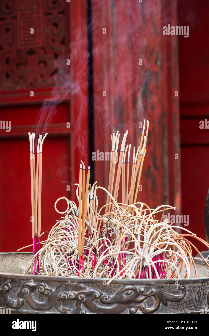 Burning joss sticks hi-res stock photography and images - Alamy