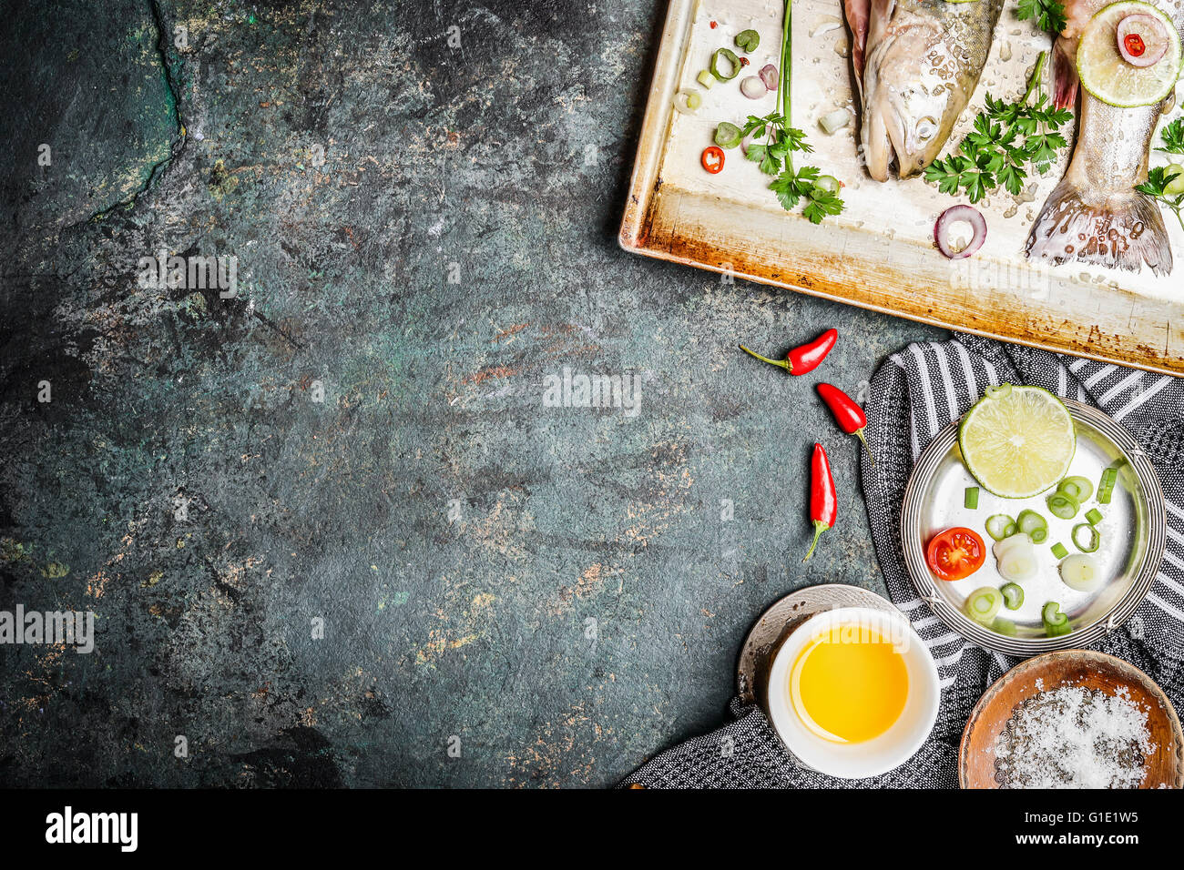 Fish cooking background with ingredients, top view. Healthy food or ...
