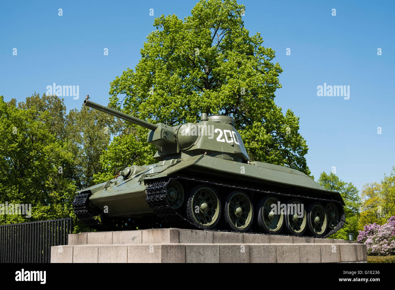 View of tank on display at Soviet War Memorial in Tiergarten Berlin ...