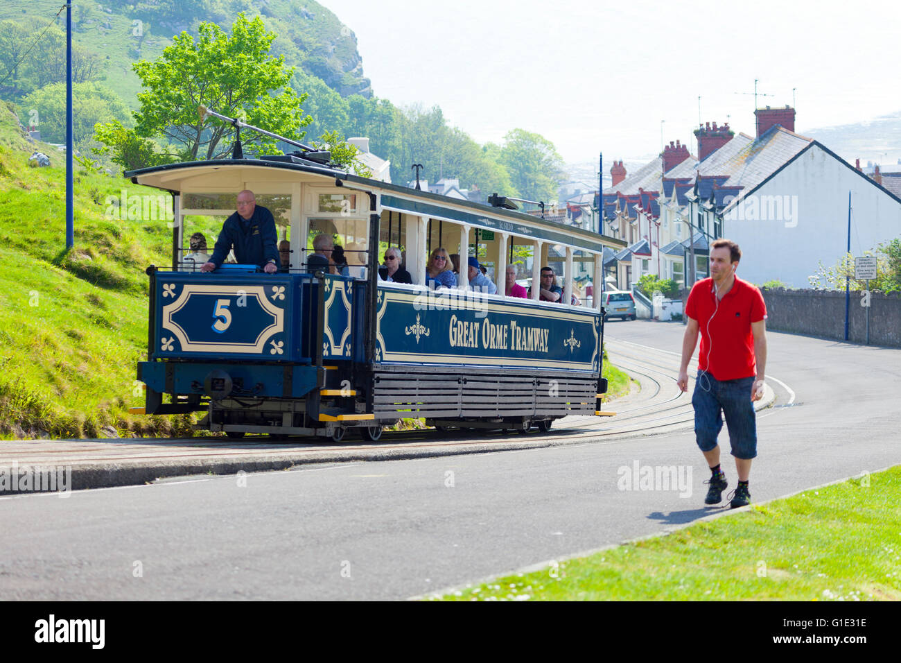 Visitors ride tram over hi-res stock photography and images - Alamy