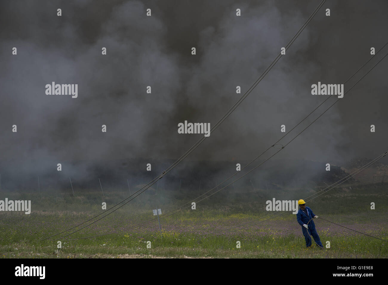 Madrid, Spain. 13th May, 2016. A fire, allegedly caused, fire a ...