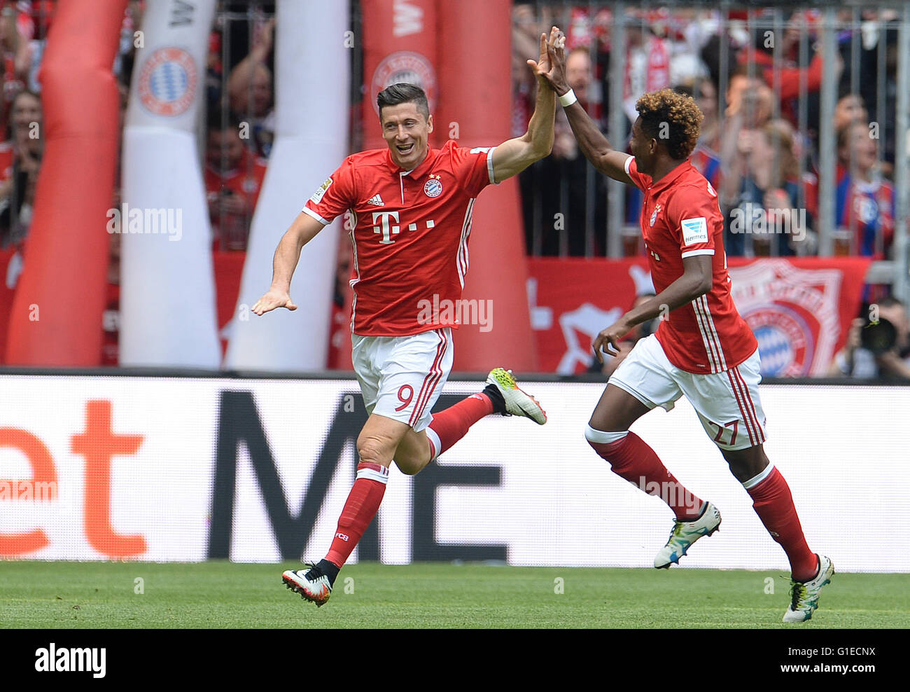 Munich, Germany. 14th May, 2016. Munichs Robert Lewandowski (l ...