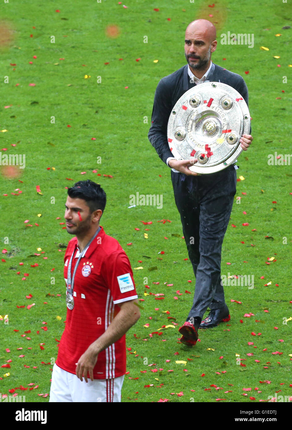 Munich, Germany. 14th May, 2016. Munich's coach Pep Guardiola stands ...