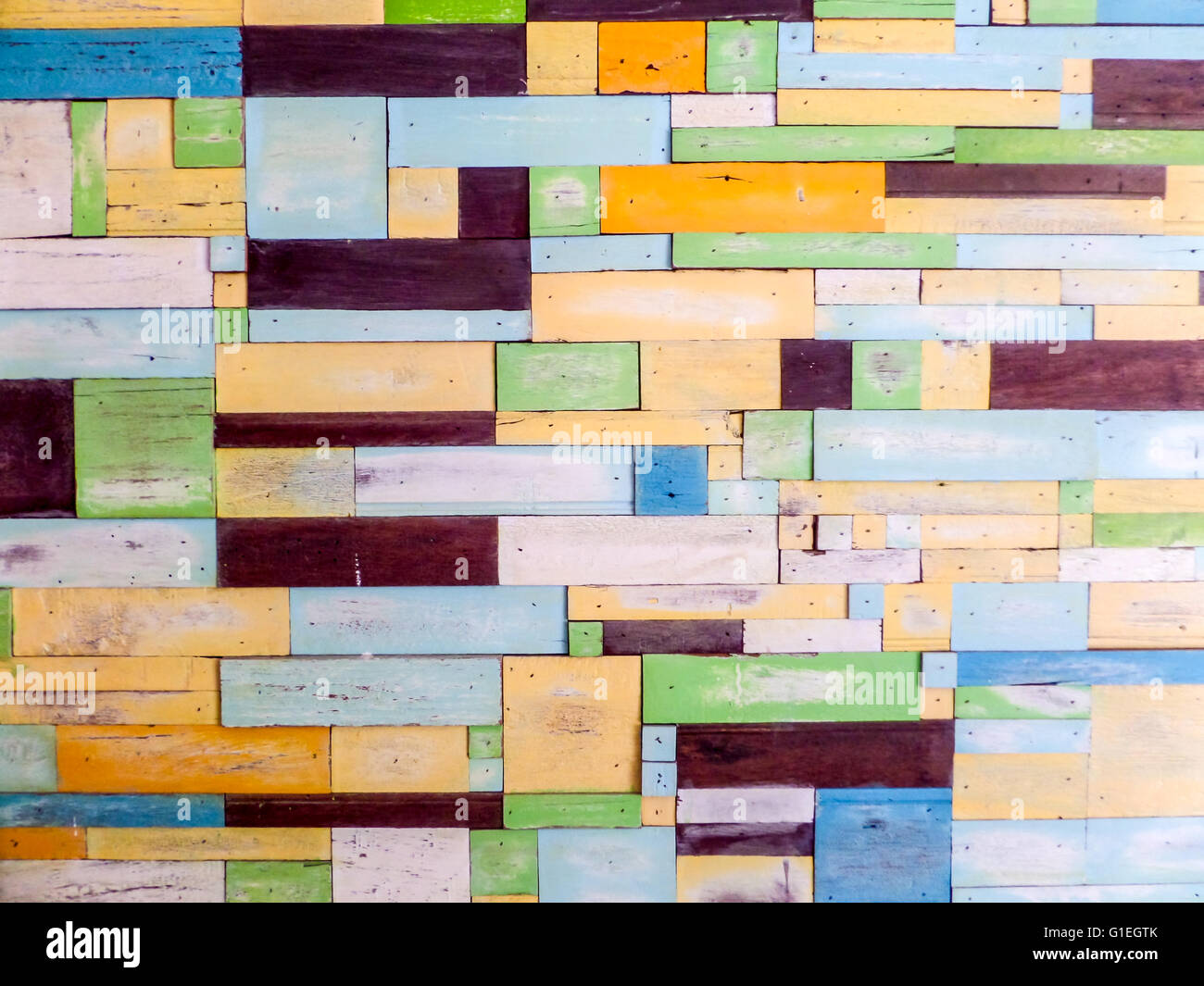 Wood pieces random fancy color on surface Stock Photo - Alamy