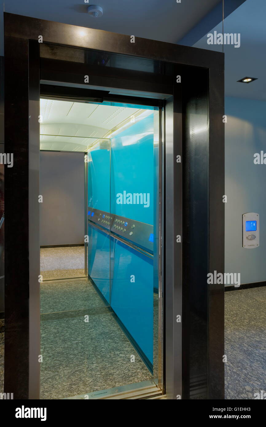 Lift door entrance, residential apartment building Stock Photo - Alamy