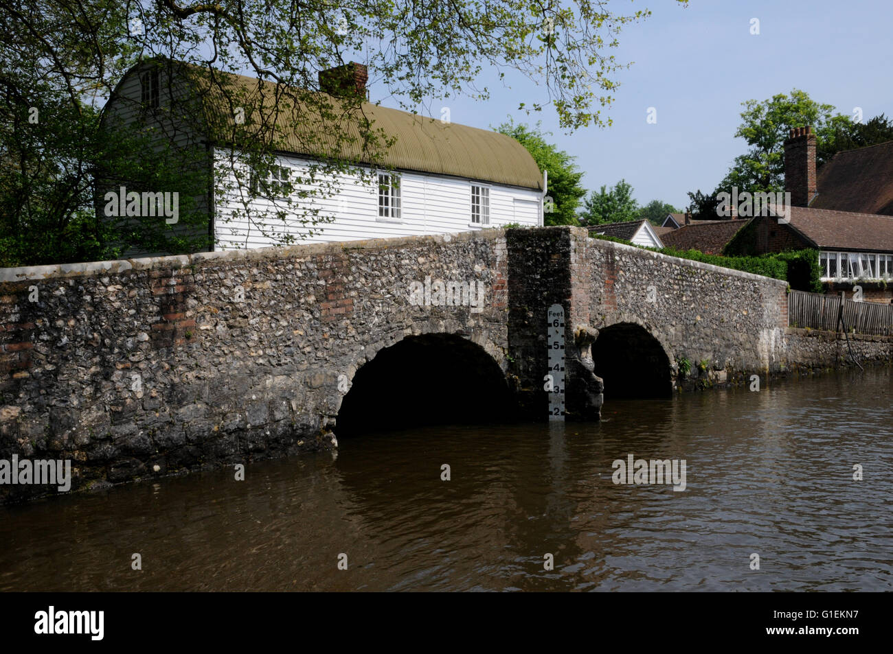 Mill Cottage tucked behind the bridge over the River Darent in the ...