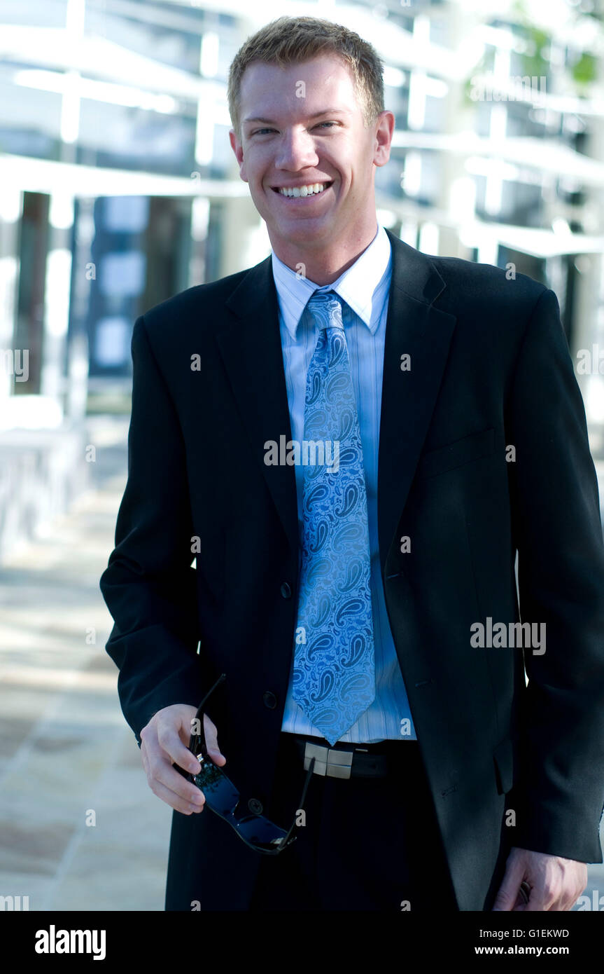 Young attractive business man in series of poses Stock Photo - Alamy