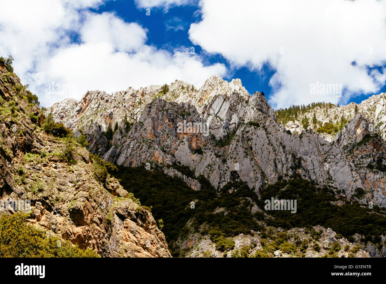 Tibet, China - The view of a desolate rock mountain Stock Photo - Alamy
