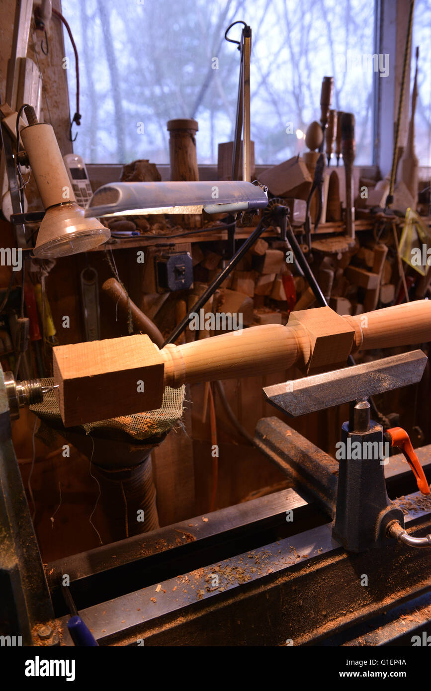 Wood turners using a rotating clamp to turn the wood, France Stock ...