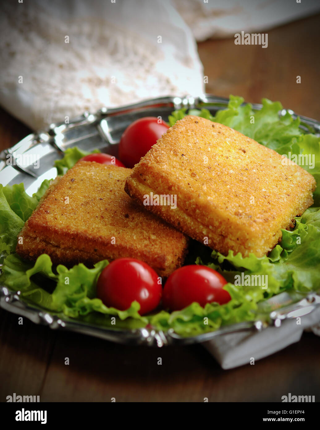 Italian fried sandwich with ham and cheese Stock Photo - Alamy
