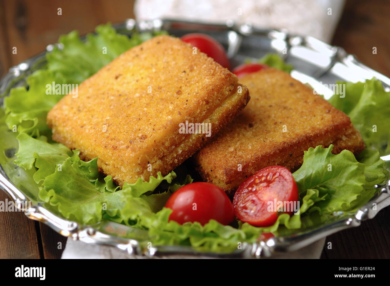 Italian fried sandwich with ham and cheese Stock Photo - Alamy