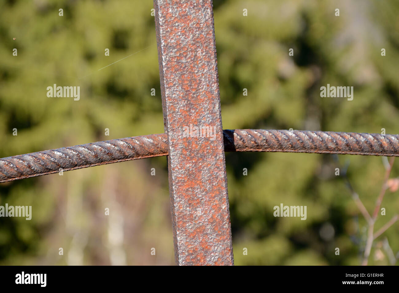 Rusty bars of old barrier on trail in mountains Stock Photo - Alamy