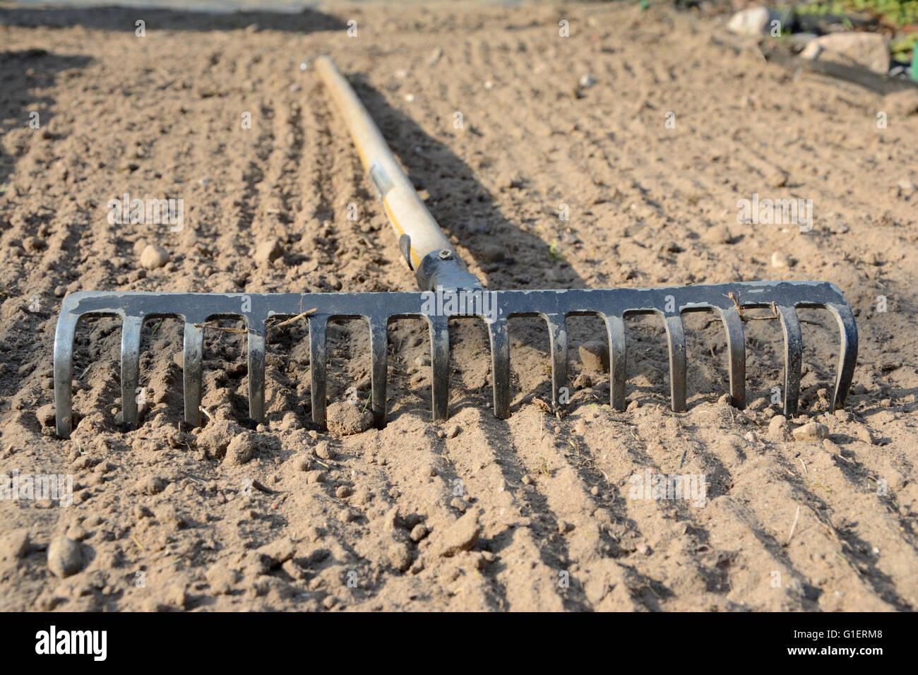 Rake soil hi-res stock photography and images - Alamy