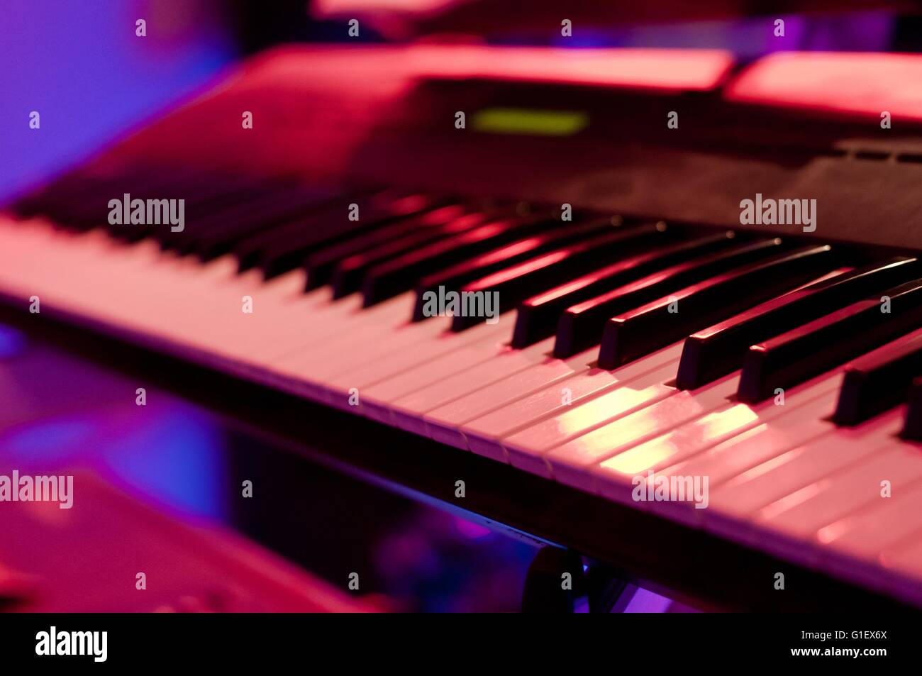 Piano keyboard in concert filled with light Stock Photo - Alamy