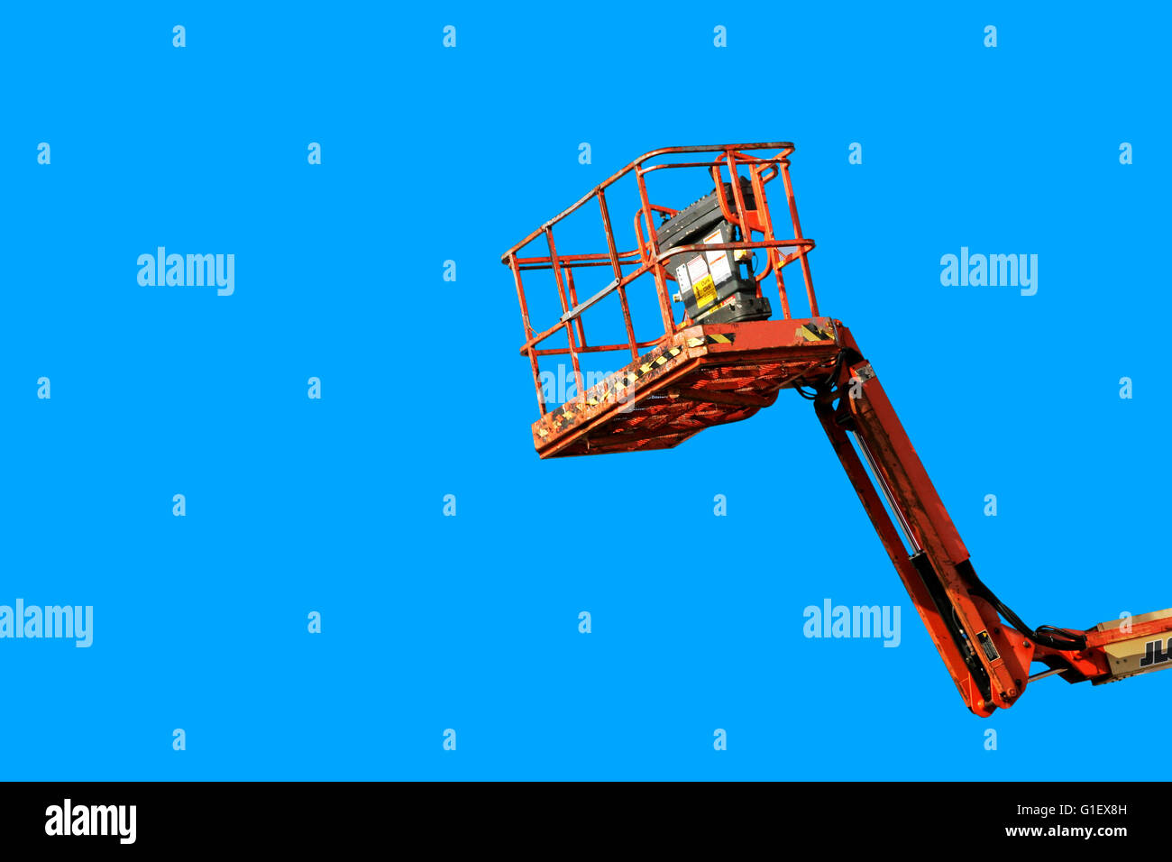 Cherry picker on a blue background Stock Photo - Alamy