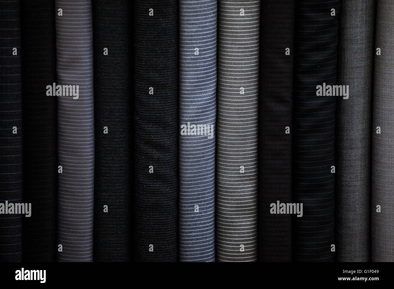 Many types of fine cloth at a bespoke tailor shop Stock Photo - Alamy