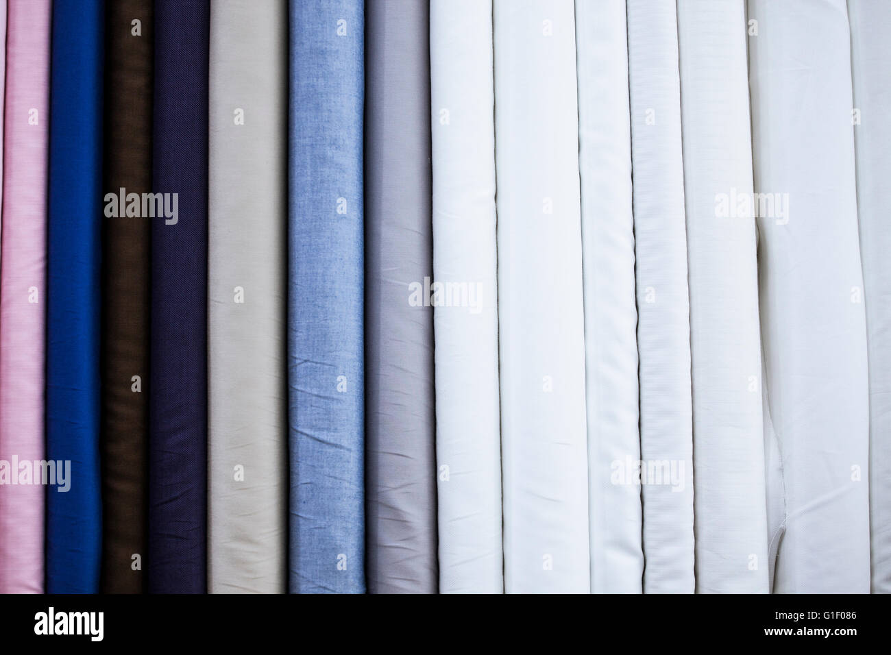 Many types of fine cloth at a bespoke tailor shop Stock Photo - Alamy