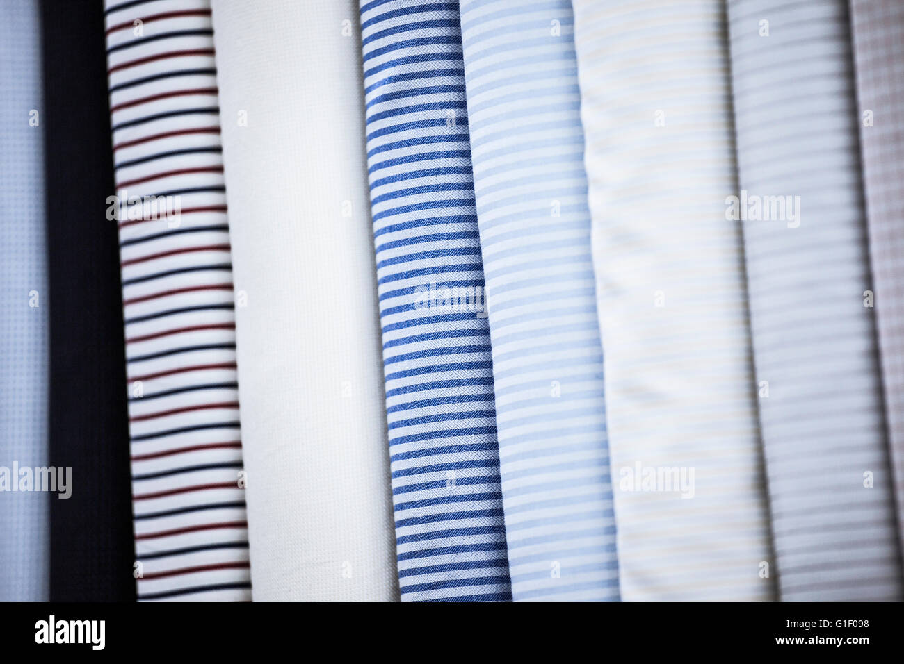 Many types of fine cloth at a bespoke tailor shop Stock Photo - Alamy
