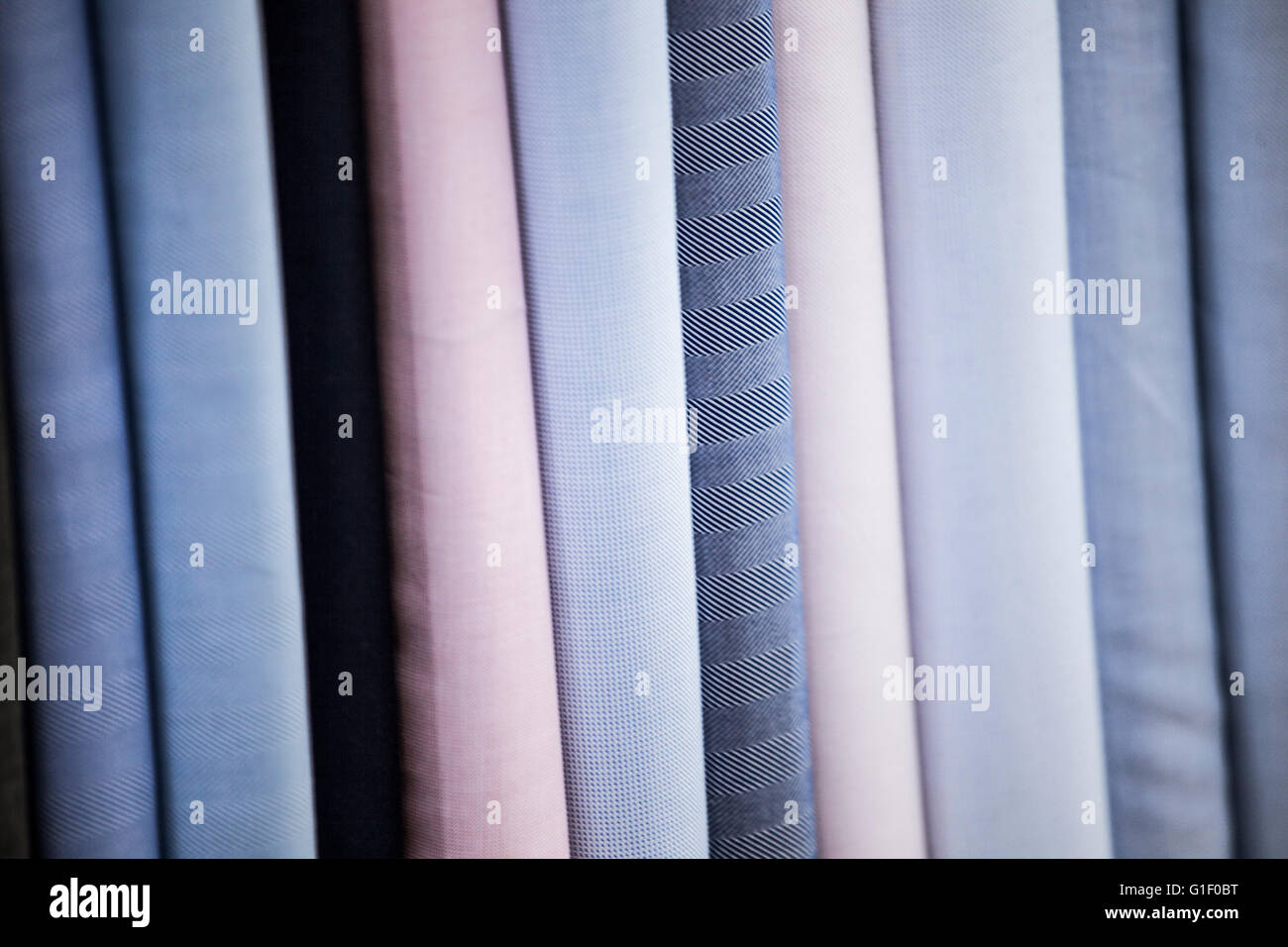 Many types of fine cloth at a bespoke tailor shop Stock Photo - Alamy