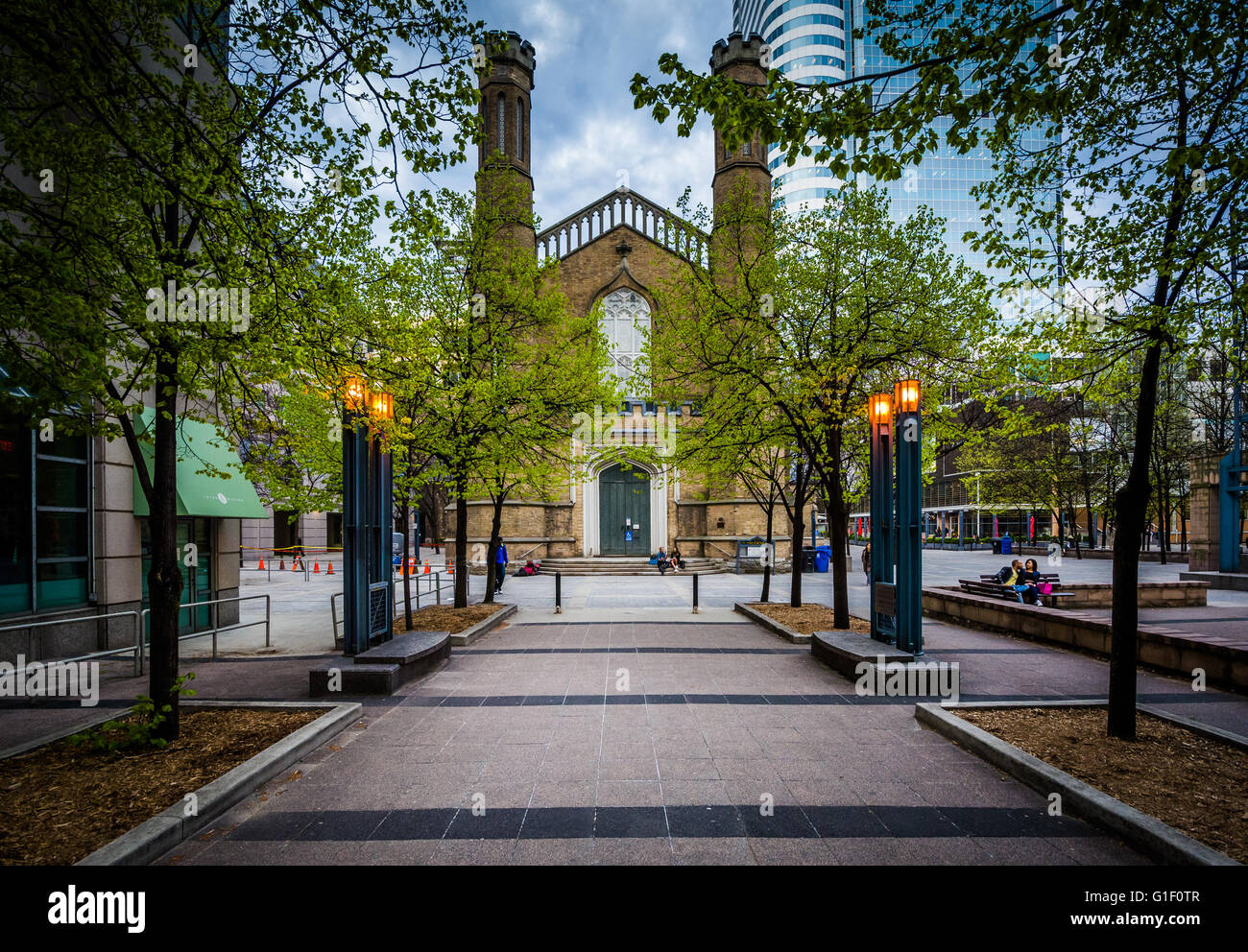 Trees along a walkway and the Church of the Holy Trinity at Trinity ...