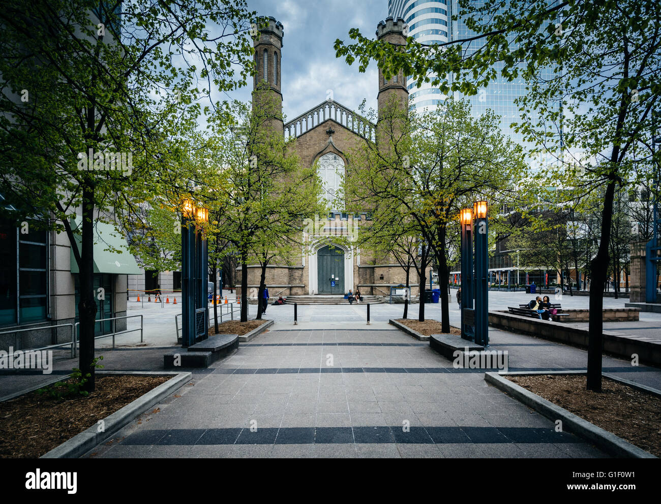 Trees along a walkway and the Church of the Holy Trinity at Trinity ...